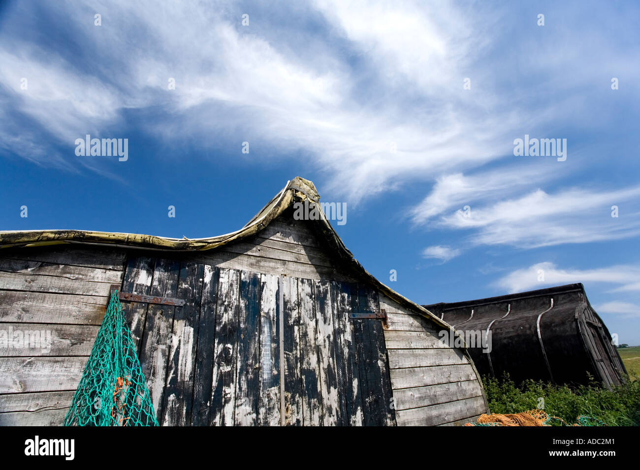 Fishermans Storehouses Upturned hulls of old fishing boats used as ...