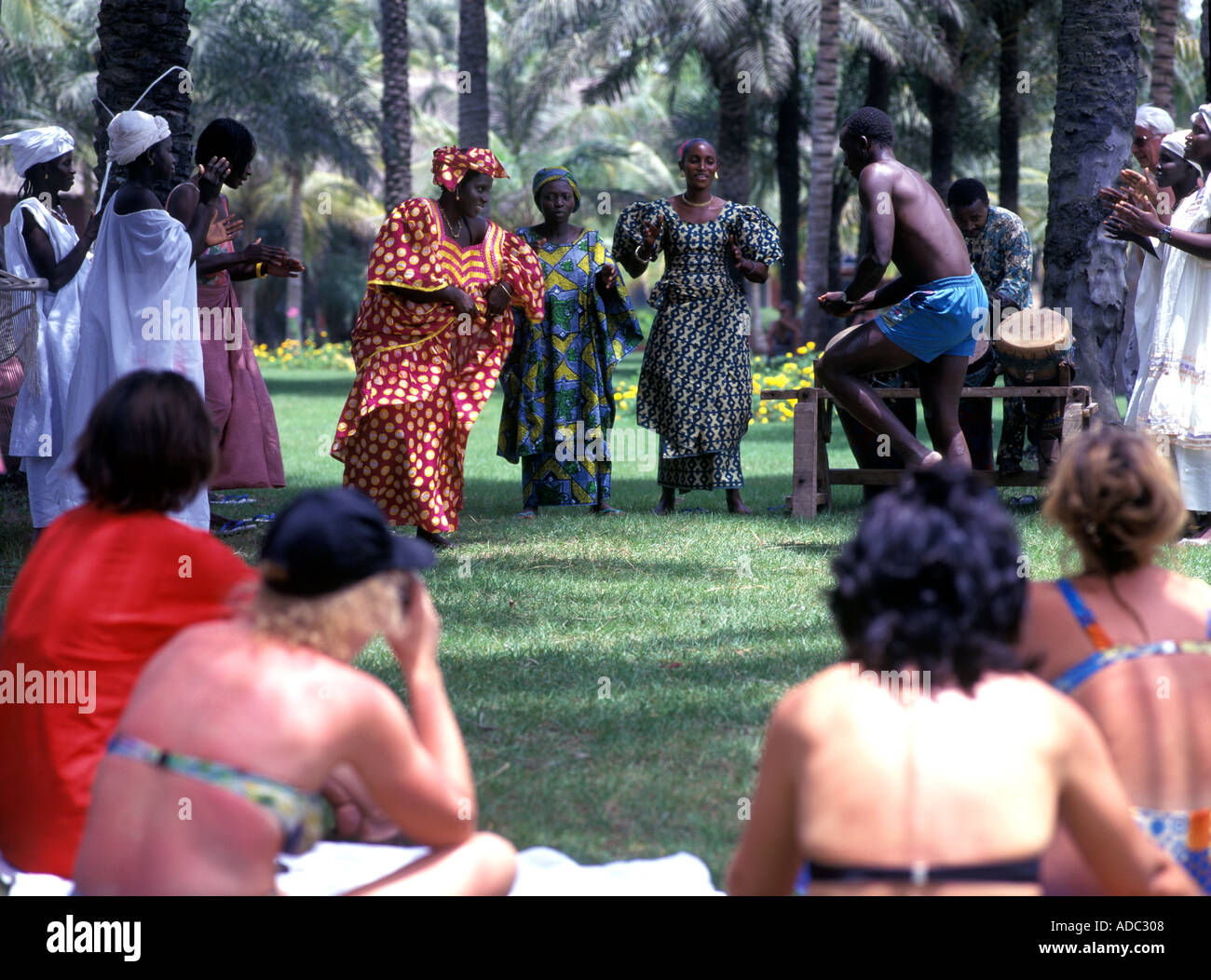 Traditional dancers entertain tourists in The Gambia West Africa Stock ...