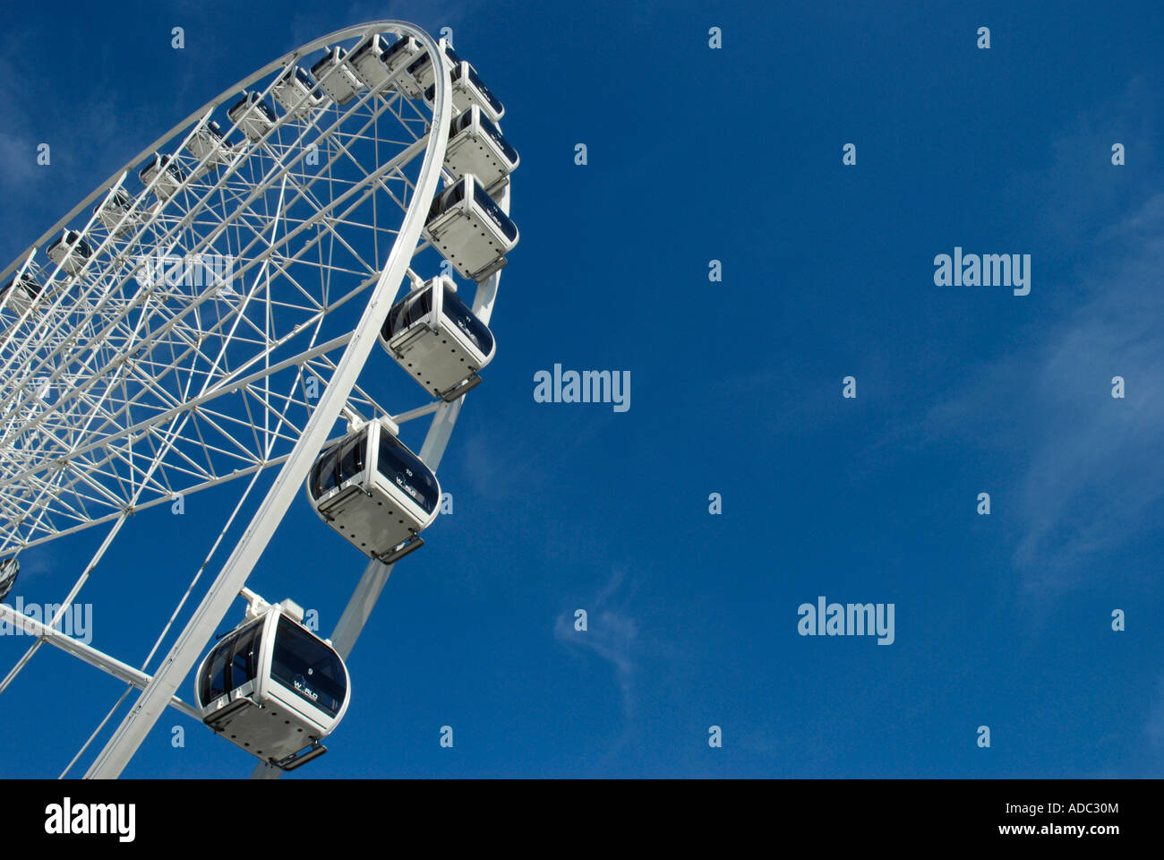 York Eye Ferris wheel against deep blue sky Stock Photo - Alamy