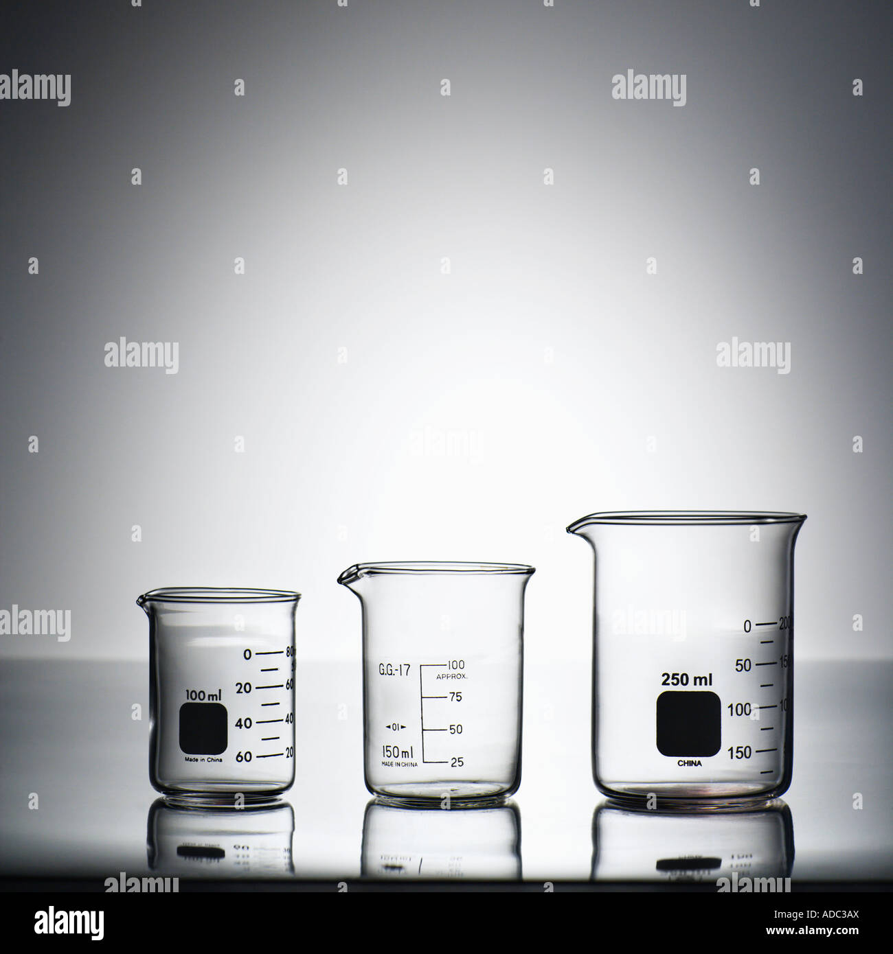Glass science beakers Stock Photo - Alamy