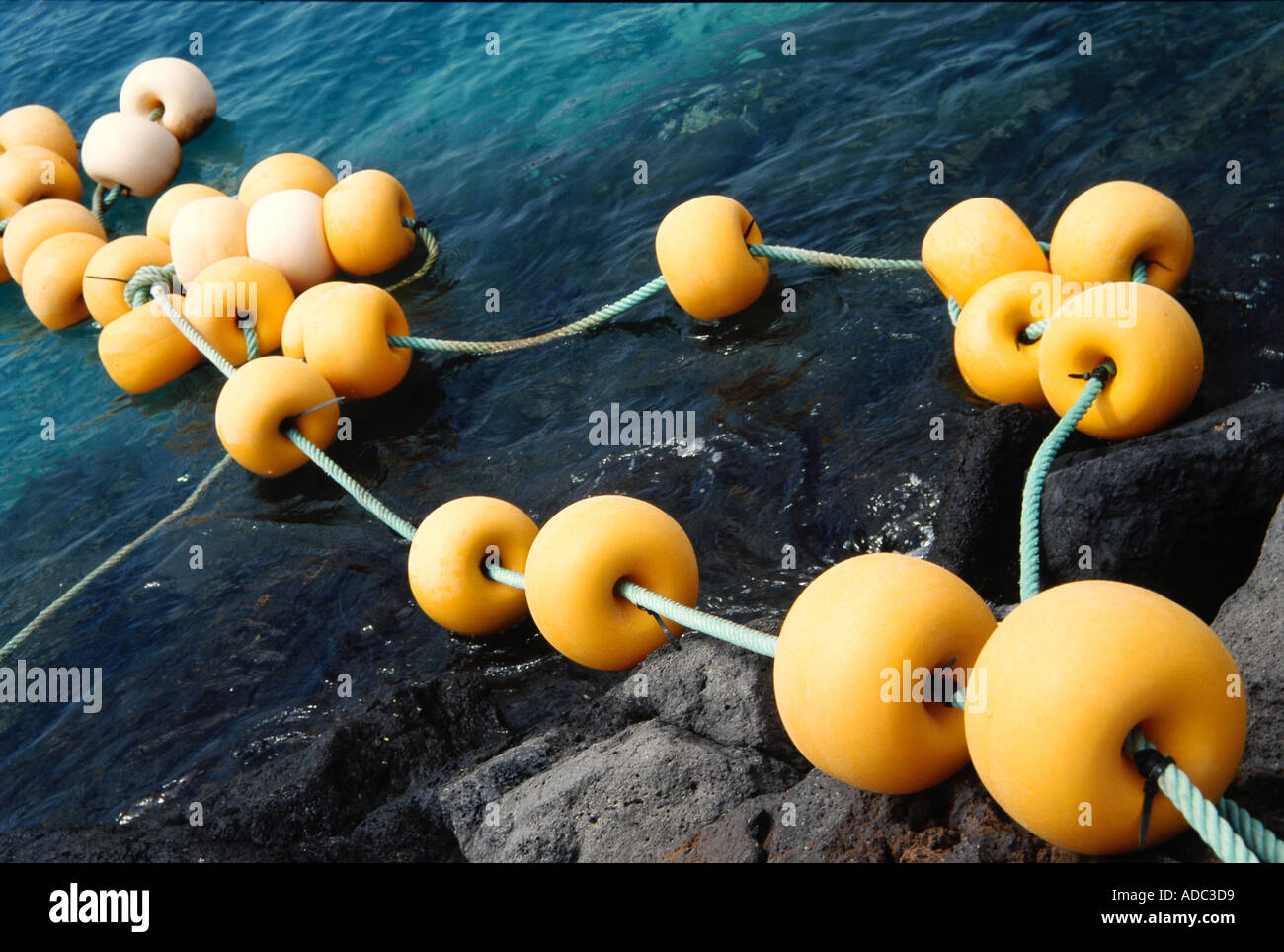 Yellow sea floats Stock Photo - Alamy