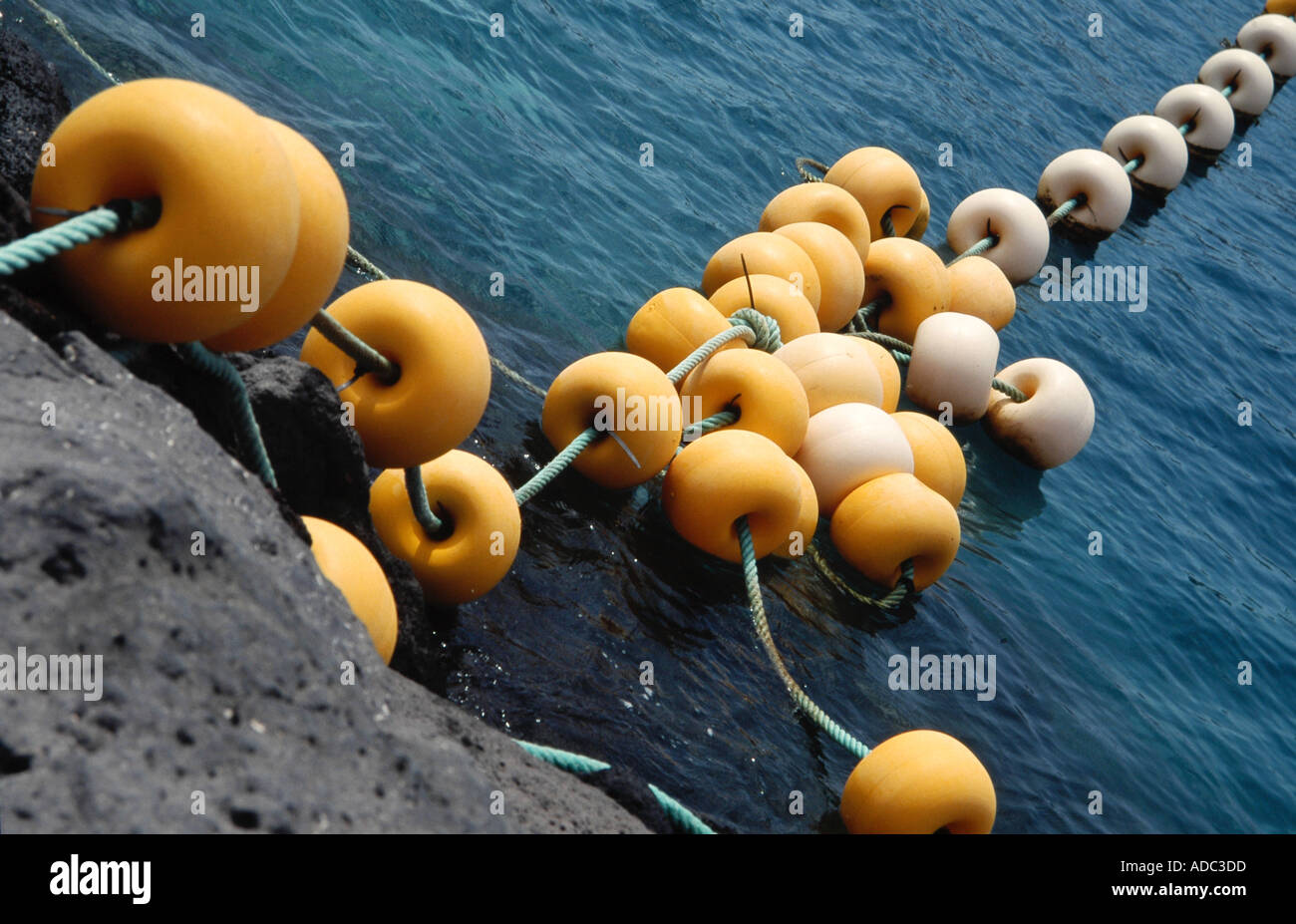 Yellow sea floats Stock Photo - Alamy