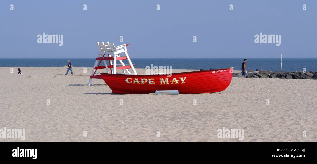 Bright Red Lifeboat and Empty Lifeguards Raised Chair on Beach at Cape ...