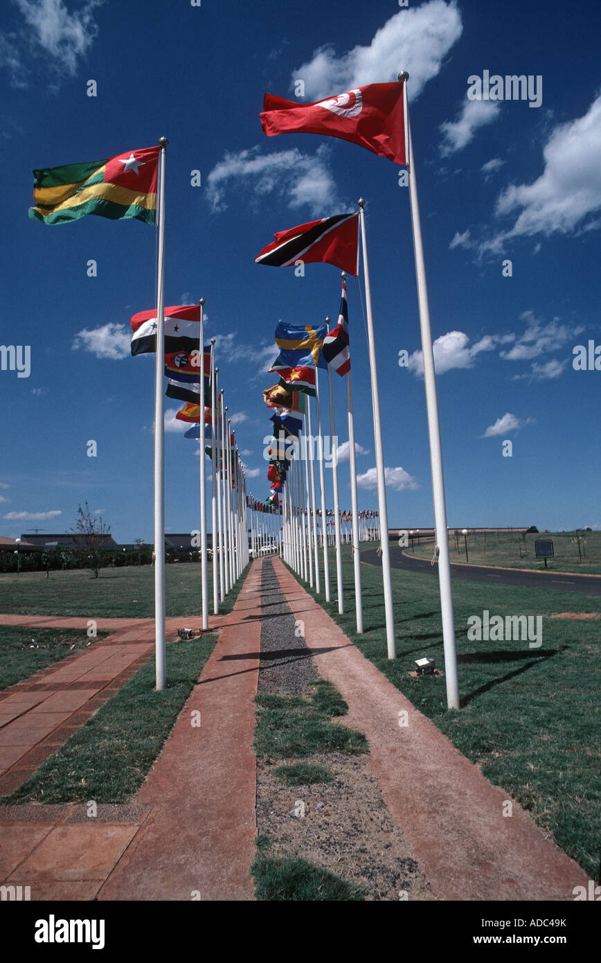 Flagpoles with national flags waving in breeze UNEP headquarters ...