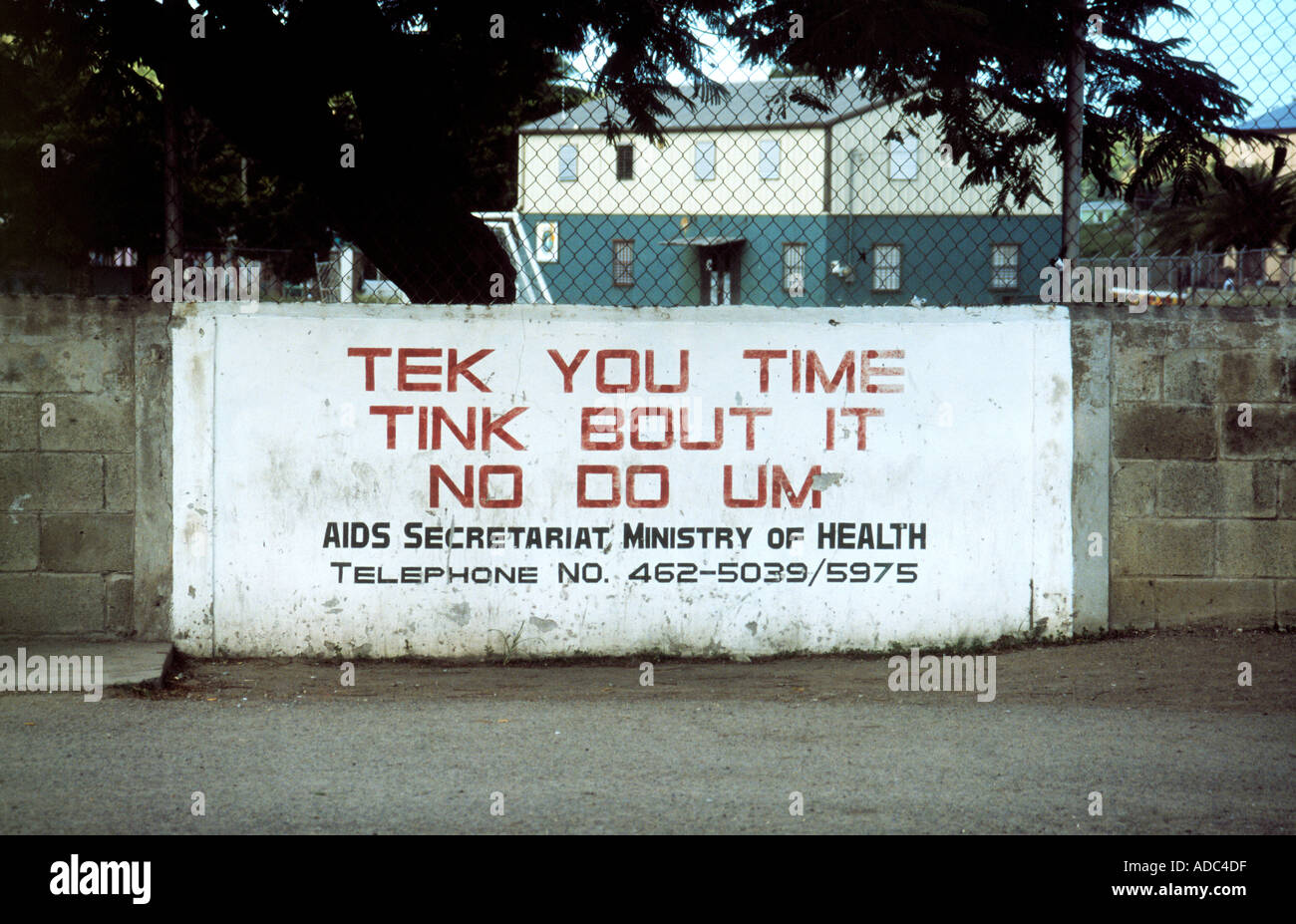 AIDS warning sign on wall in St Johns capital of Antigua Stock Photo ...