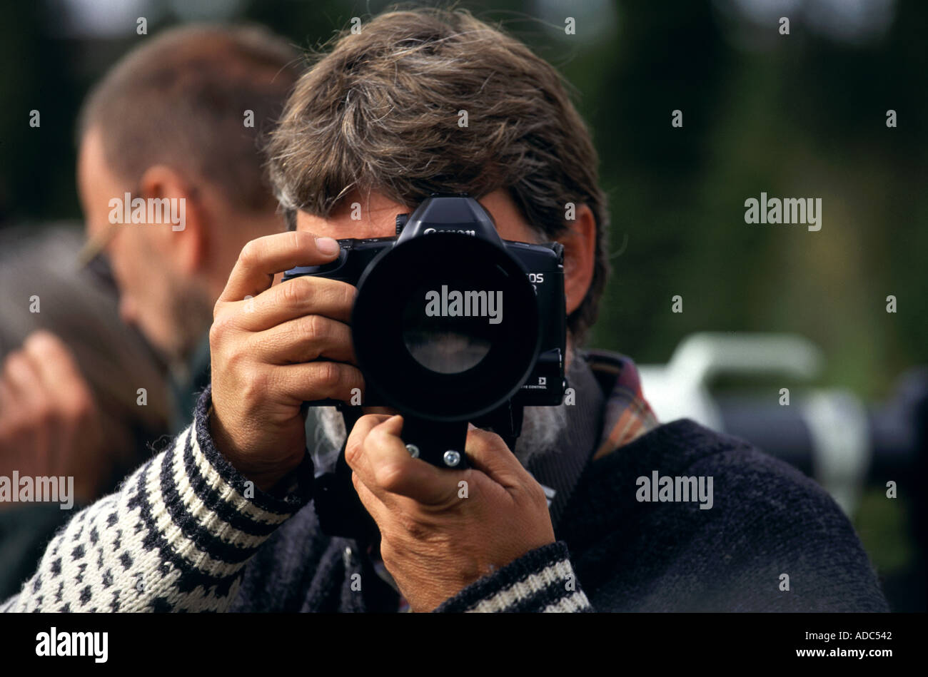 Photographer at work Stock Photo - Alamy
