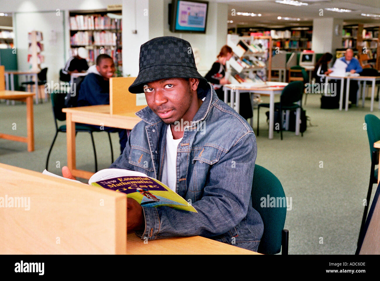 black male reading Stock Photo - Alamy
