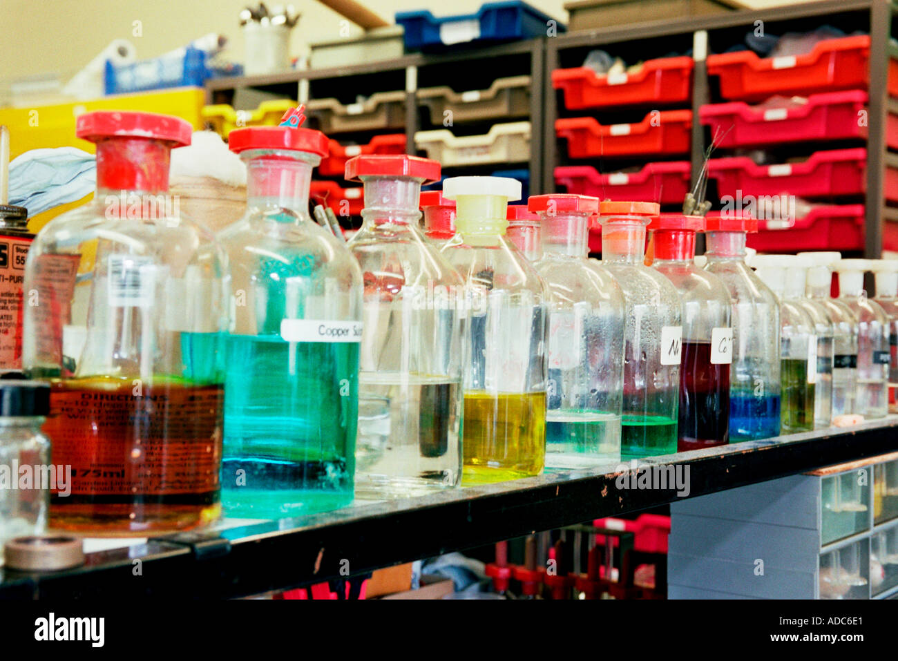 BOTTLES CONTAINING VARIOUS COLOURED CHEMICALS Stock Photo - Alamy