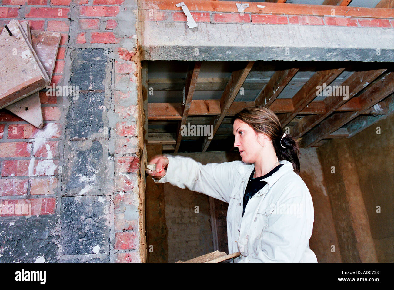 female labourer construction training Stock Photo - Alamy