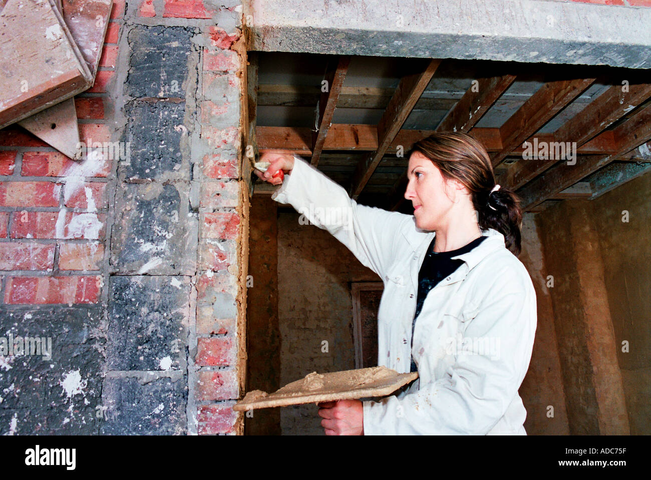 female labourer construction training Stock Photo - Alamy