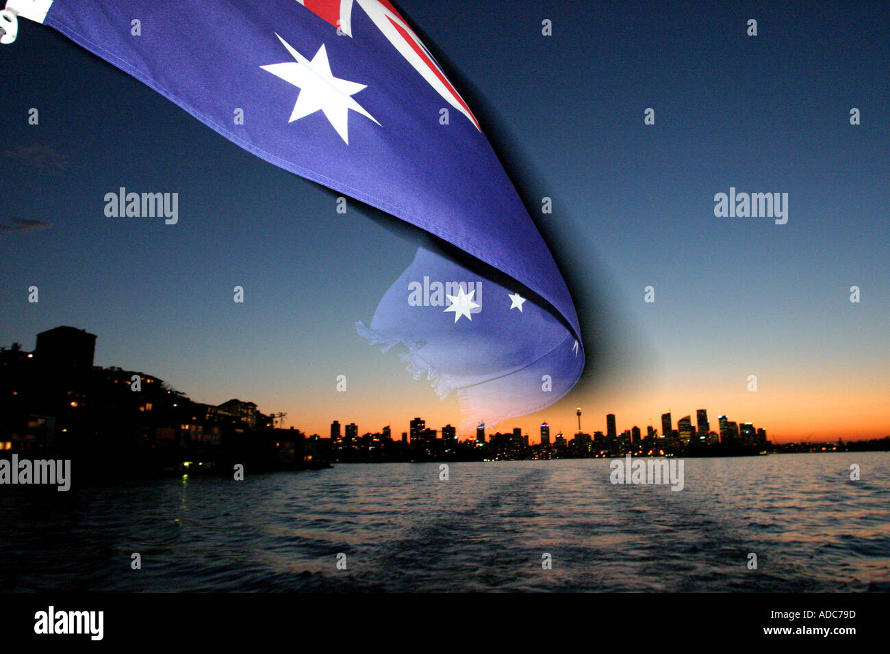 Australian Flag Sydney Harbour and CBD at dusk Sydney Australia Stock ...