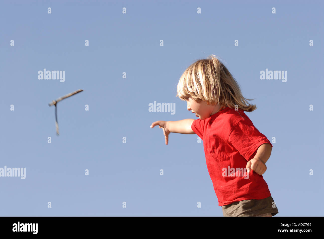 Child with a stick hi-res stock photography and images - Alamy