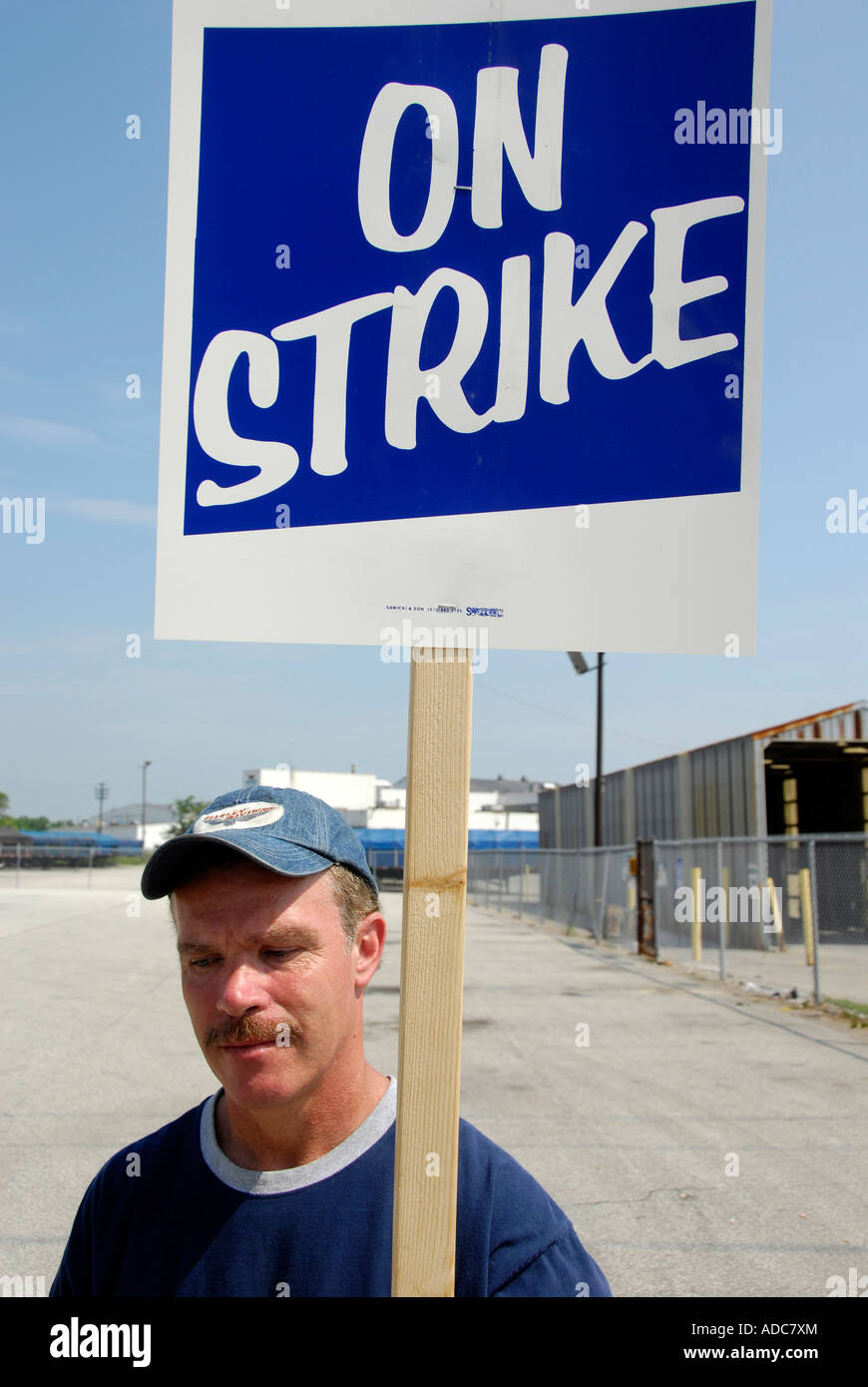 UAW protest on picket line against low wages and benefits with anti ...