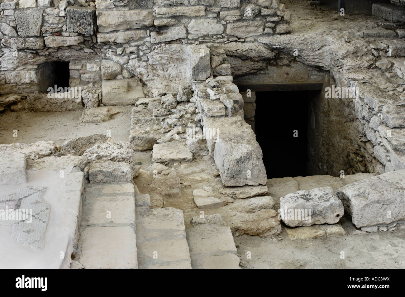 Entrance into underground dungeon Stock Photo - Alamy