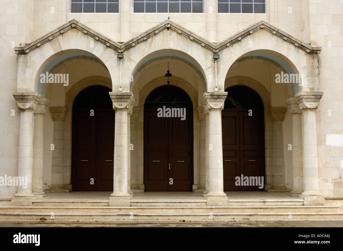 Entrance with columns and arches Stock Photo - Alamy