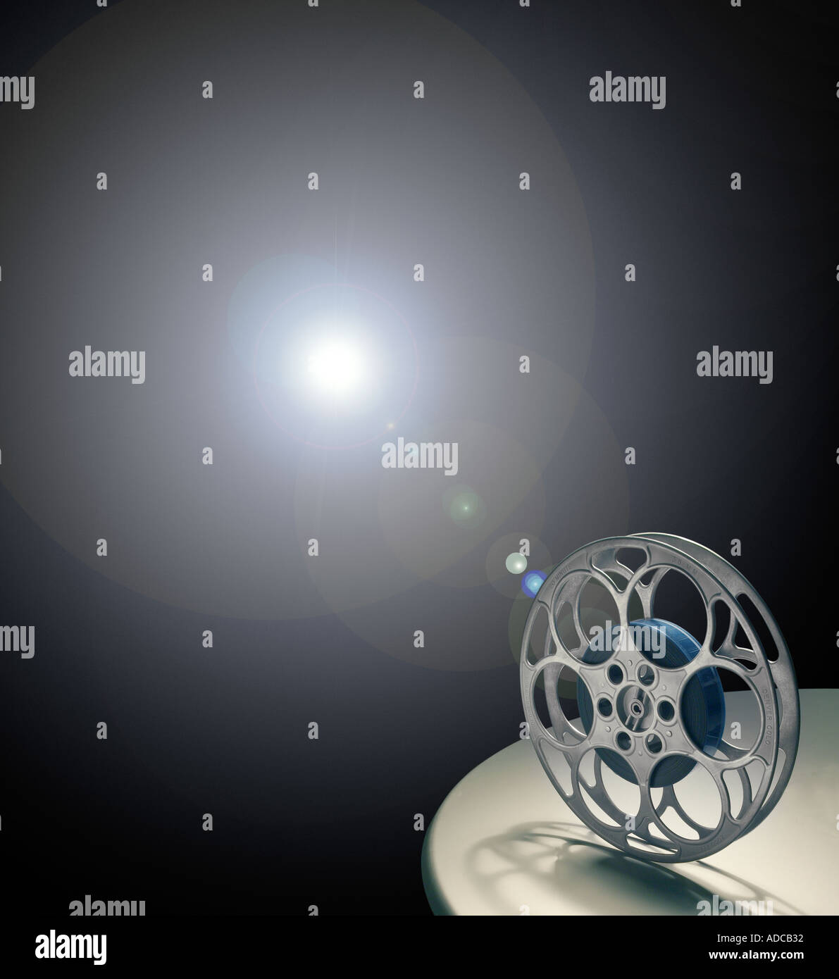 Movie Film Reel & Bright Projection Light Stock Photo - Alamy