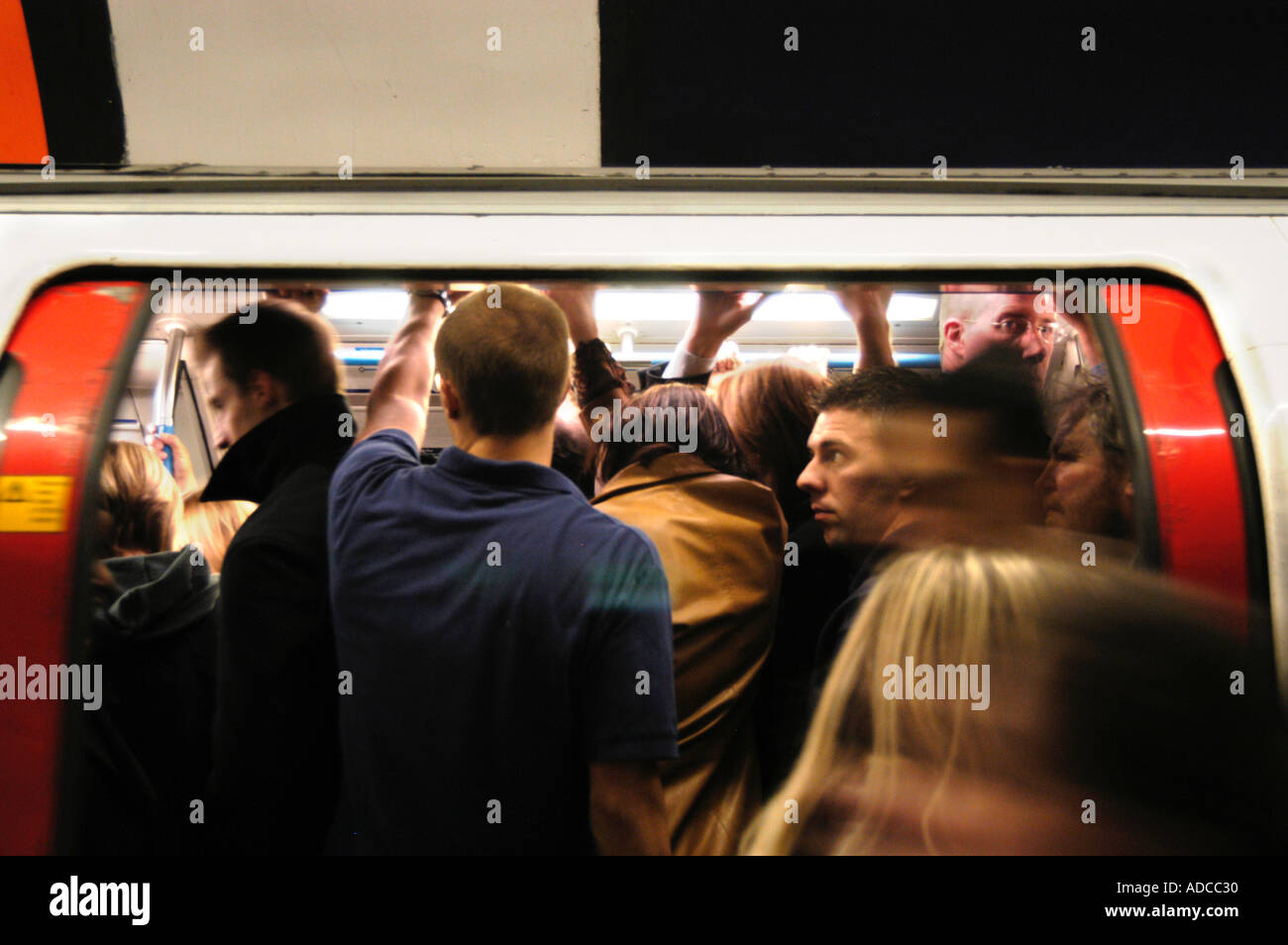 Overcrowded London Underground train during the rush hour England UK ...