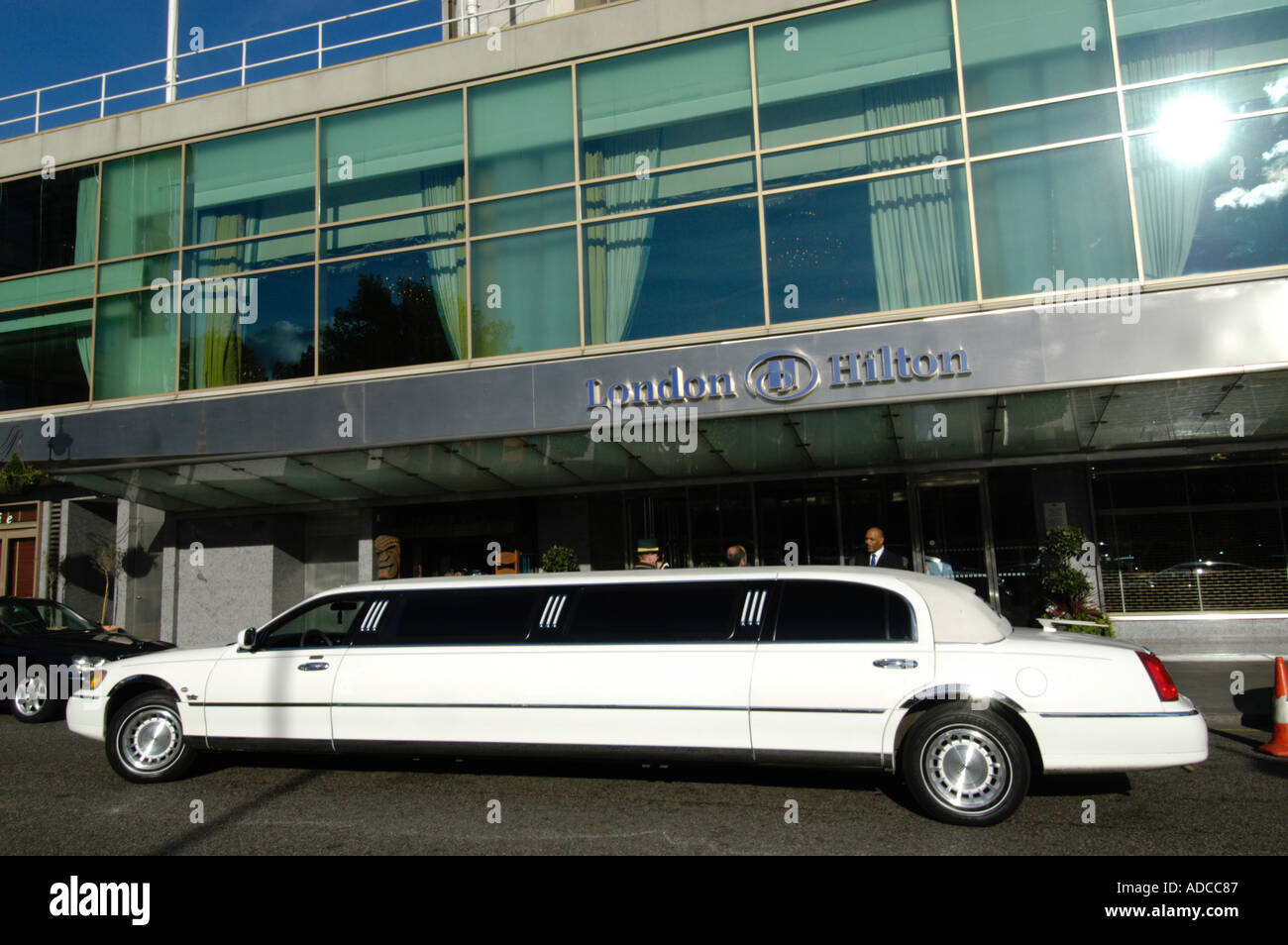 White stretch limousine at the London Hilton Hotel Mayfair England UK ...