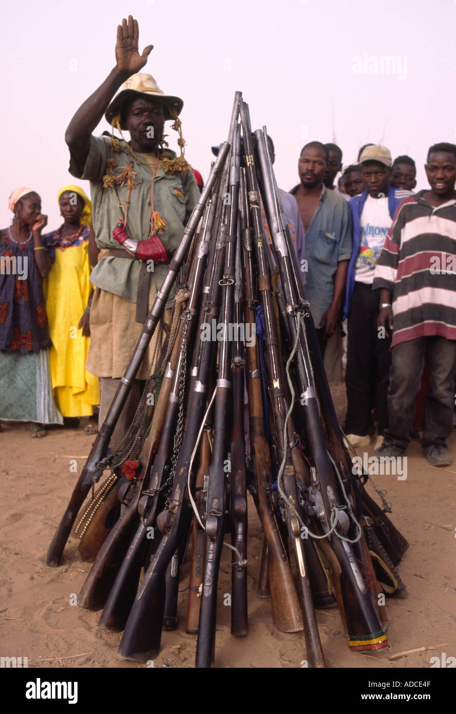 Blessing rifles ceremony in a Dogon village in Mali Stock Photo - Alamy