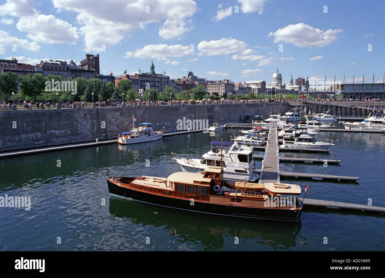 Boats in harbor at port of Old Montreal, Quebec Canada Stock Photo - Alamy