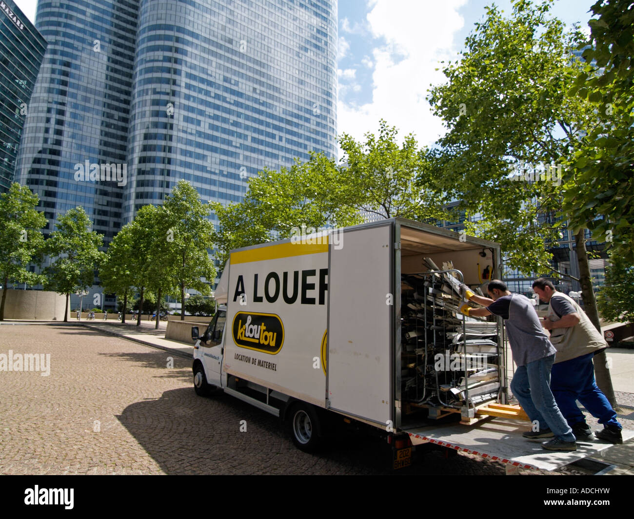 Two men loading a rental van in the La Defense financial district of ...