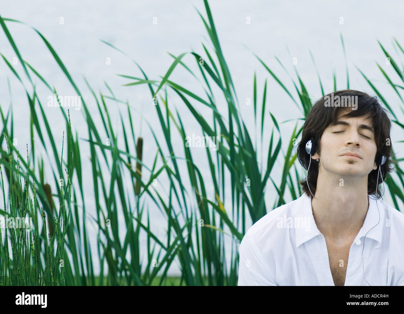 Man Listening To Headphones Eyes Closed Stock Photo Alamy