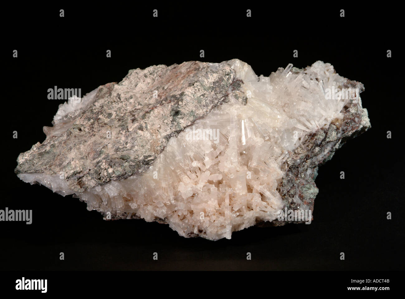 Mineral Natrolite, Natrolite crystals in a sandwich of tourmaline, Dean ...