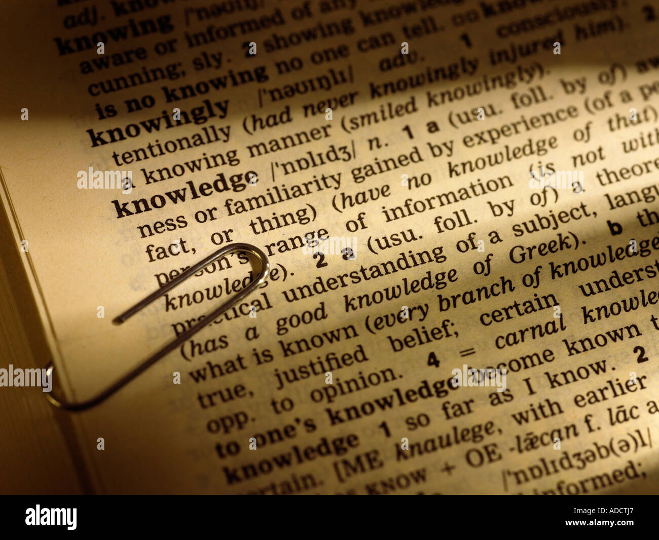 the word knowledge marked in the dictionary Stock Photo - Alamy