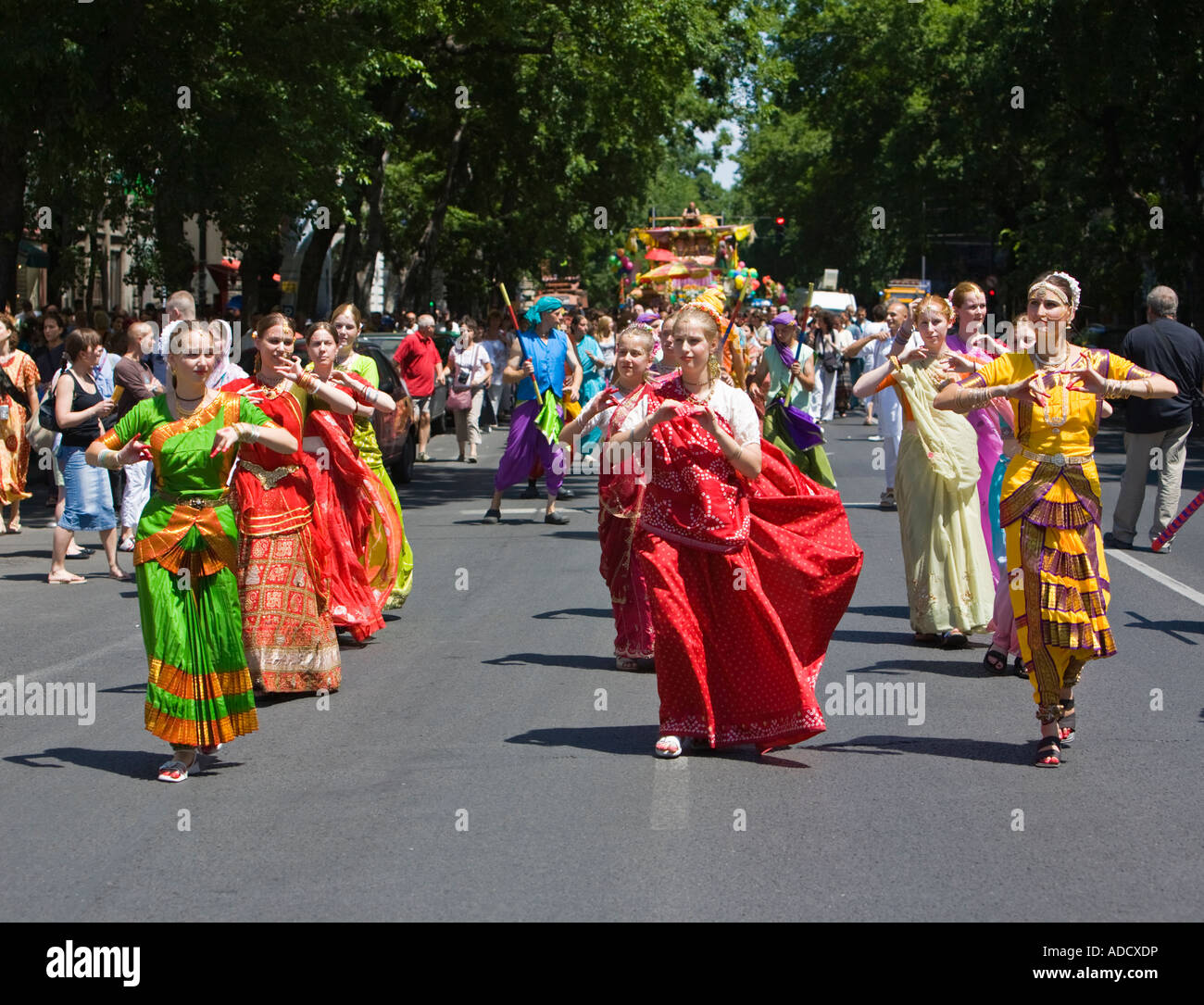 Female Hare Krishna dancers taking part in summer parade through the ...