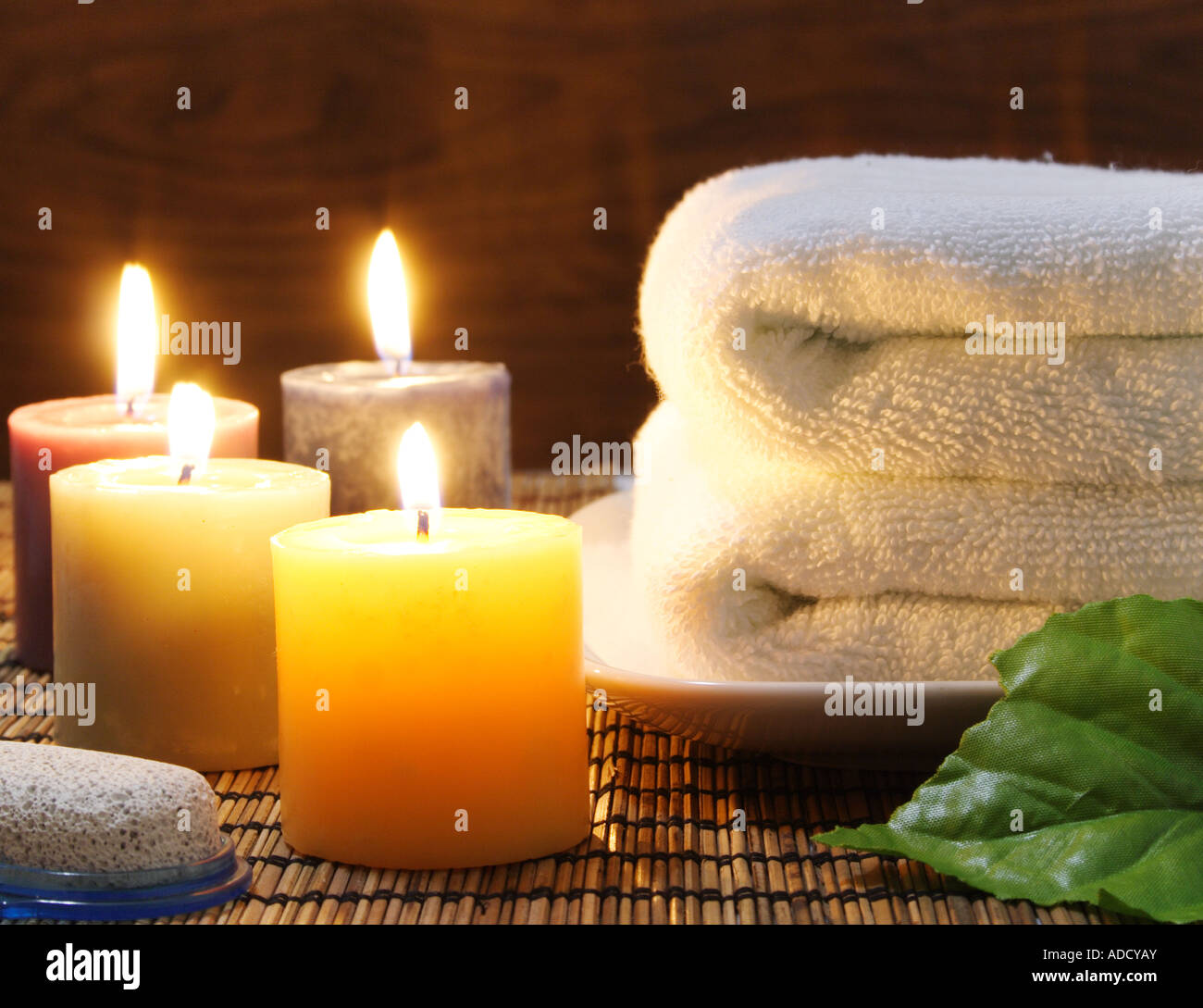 Towel, aromatic candles and other spa objects to make mood relaxing ...