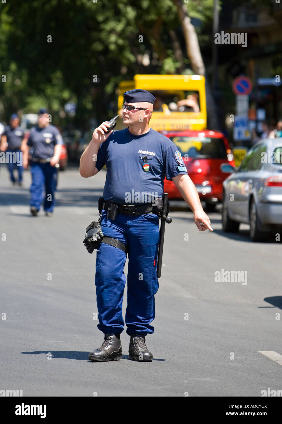 A Hungarian policeman (rendorseg) at work during a parade through ...