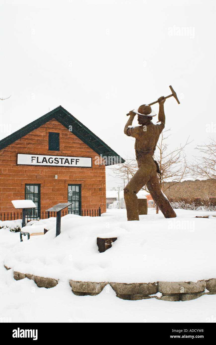 Gandy Dancer bronze sculpture wears winter snow in downtown Flagstaff ...