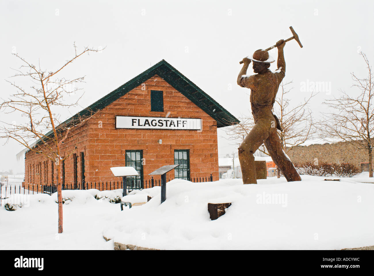 Gandy Dancer bronze sculpture wears winter snow in downtown Flagstaff ...