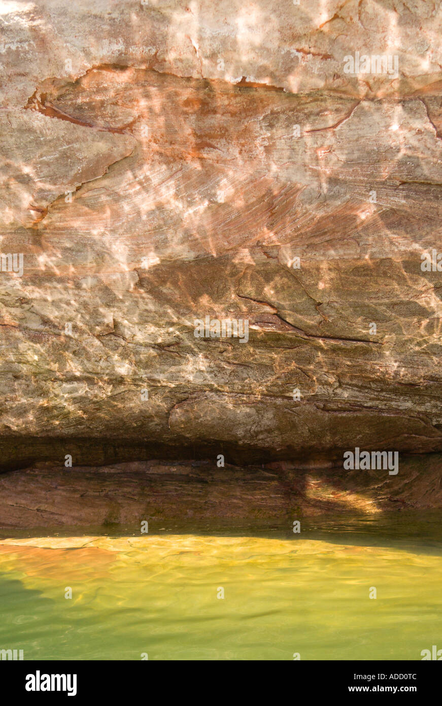 Sunlight reflects on the rock walls of Lake Powell A part of the Glen ...