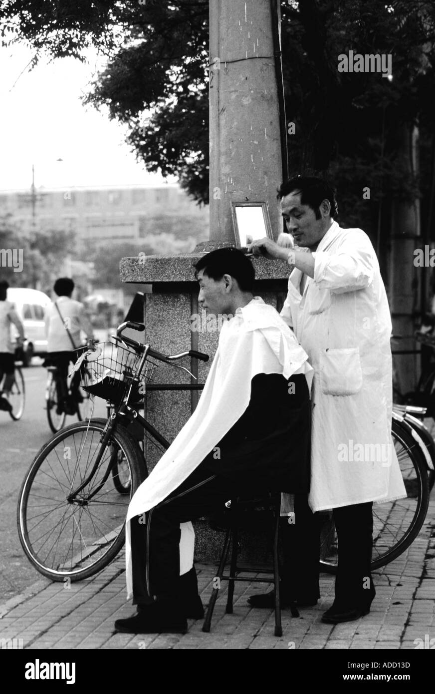 Barber shop in the street hi-res stock photography and images - Alamy
