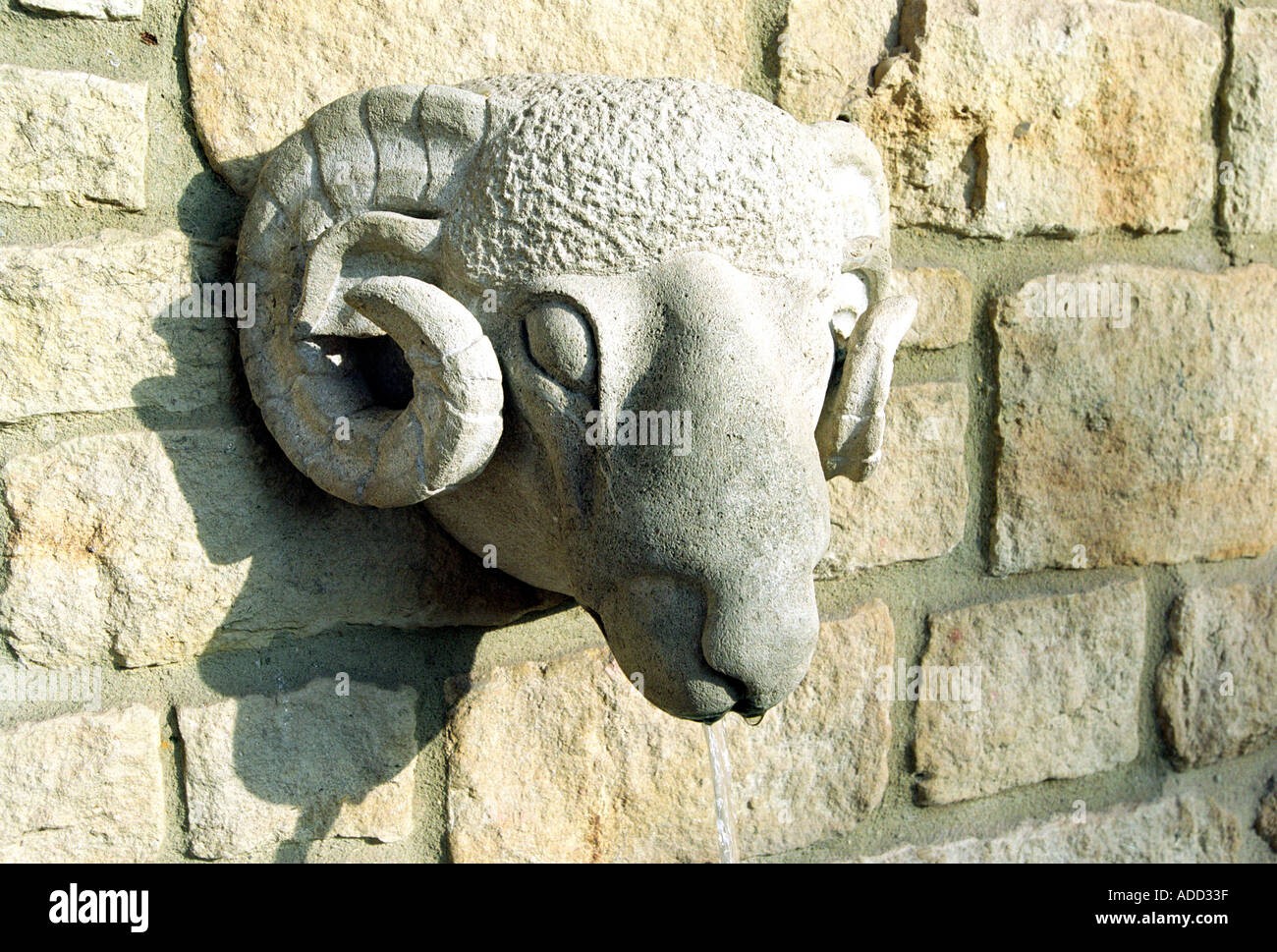 Ram's head sculpture at Poundbury Village in Dorset England UK Stock ...