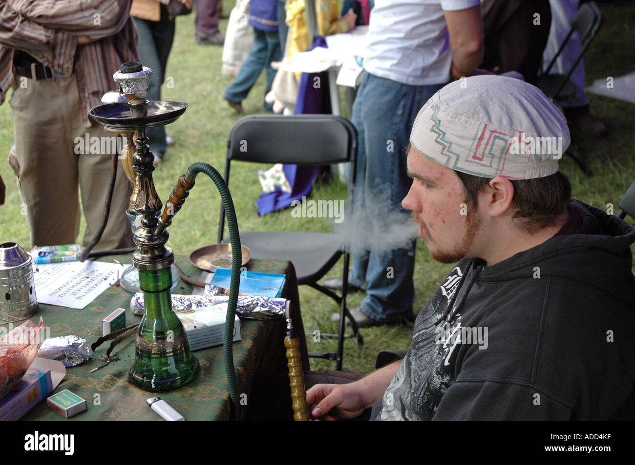 Scientific festival in Warsaw - man smoking tobacco from hookah Stock ...