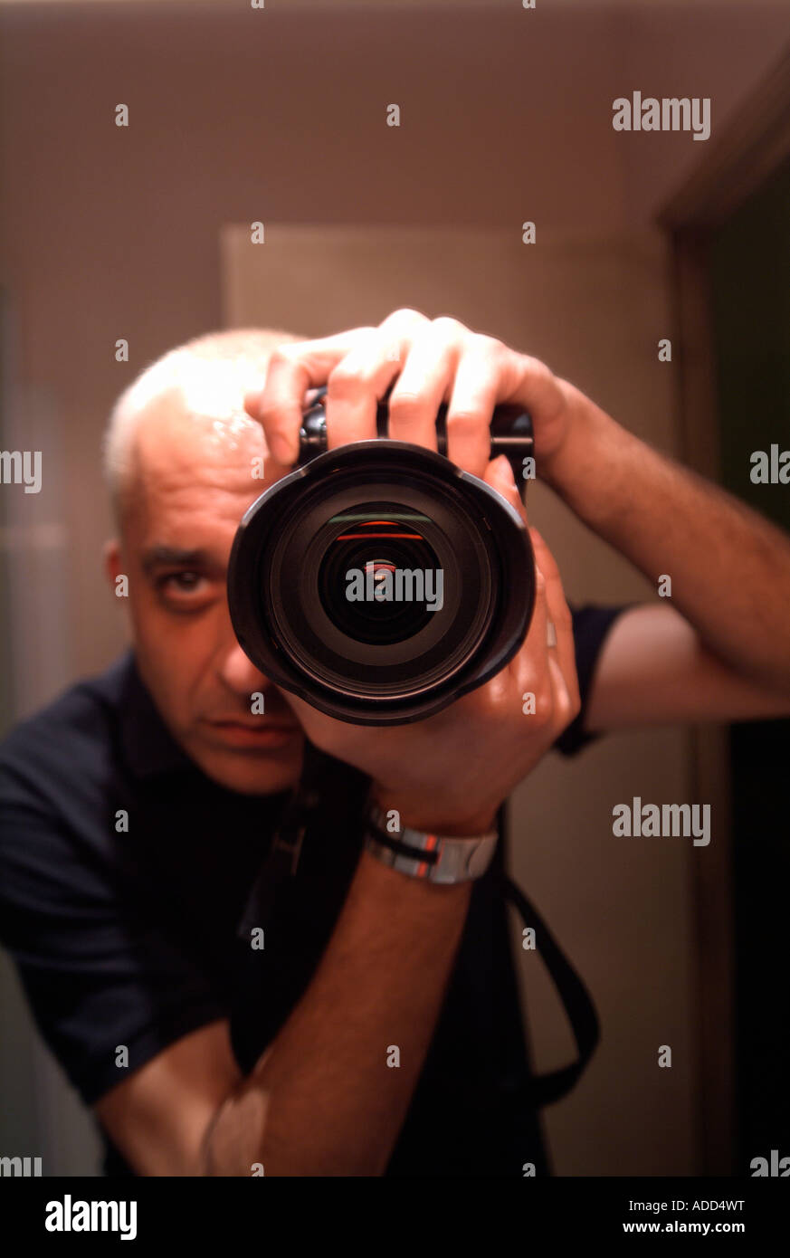 Self-portrait in a looking glass Stock Photo - Alamy