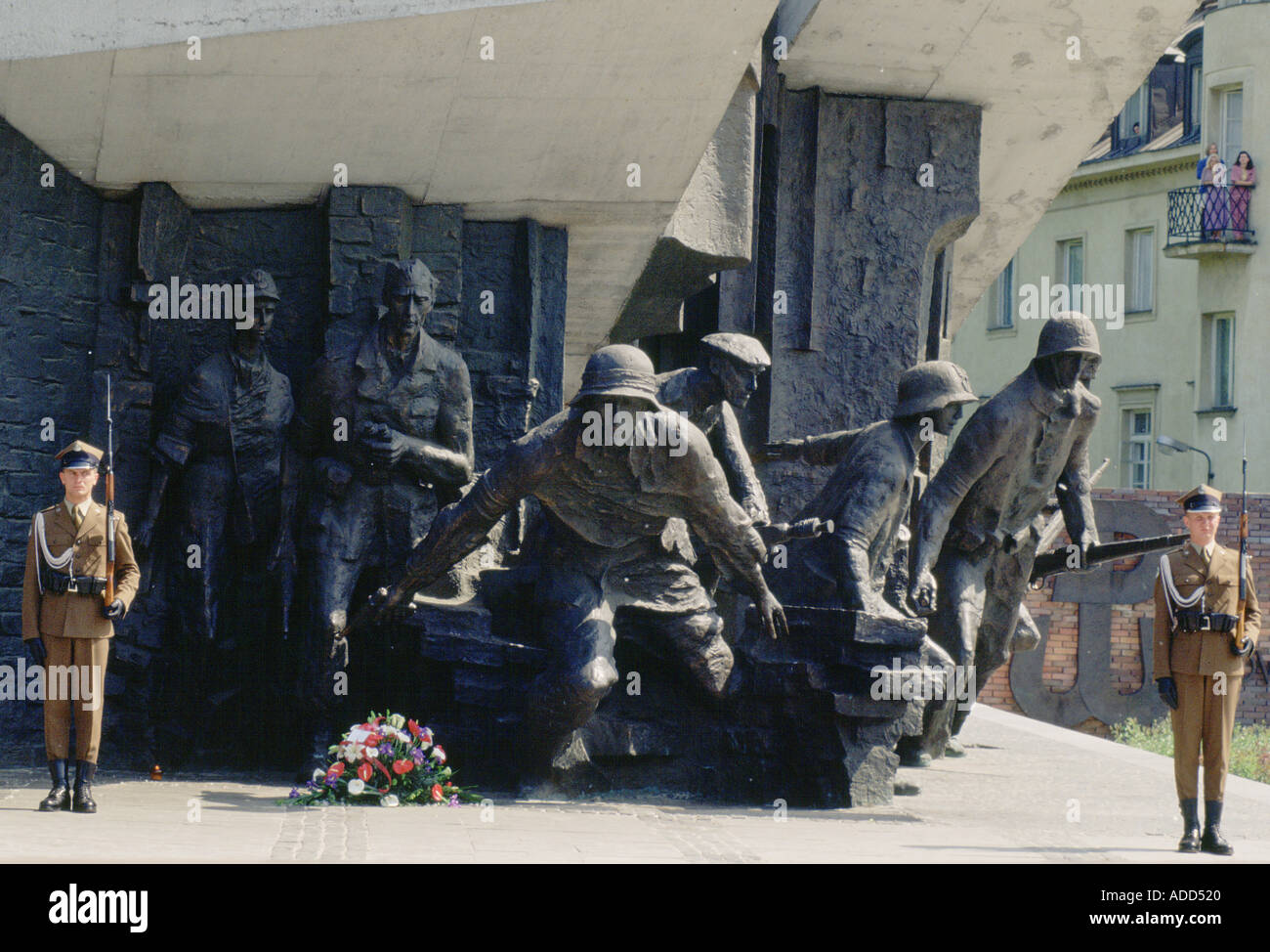 Soldiers standing at attention with rifles to guard the Warsaw Uprising ...