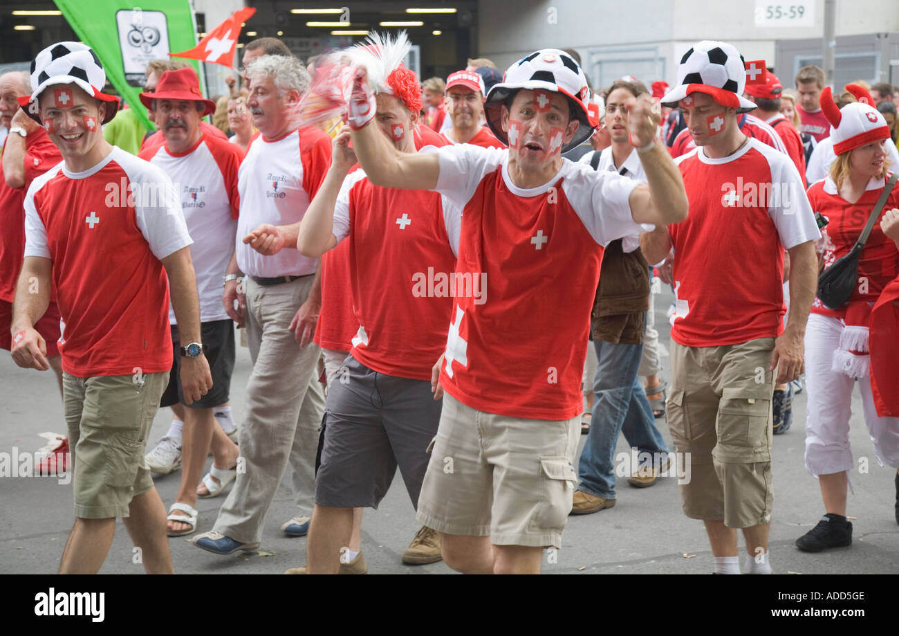 Swiss football fans cheering in good mood in front of the Dortmund ...