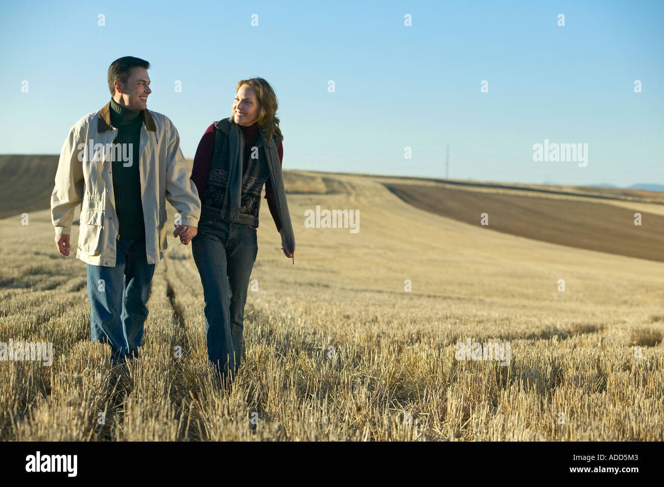 Walking together through fields hi-res stock photography and images - Alamy