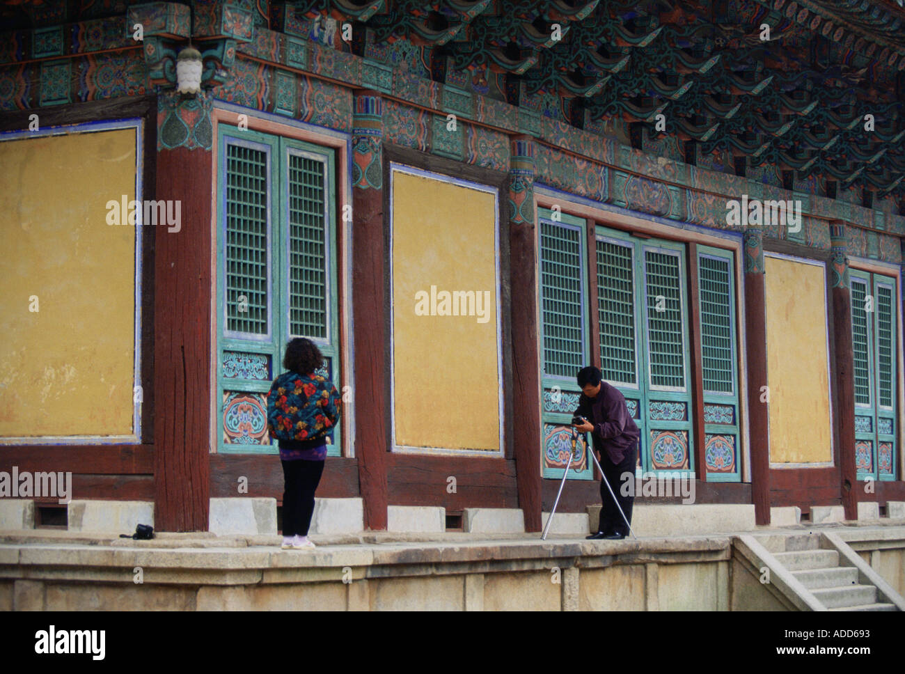 Tourists visiting Pulguksa Temple in South Korea take photographs of ...