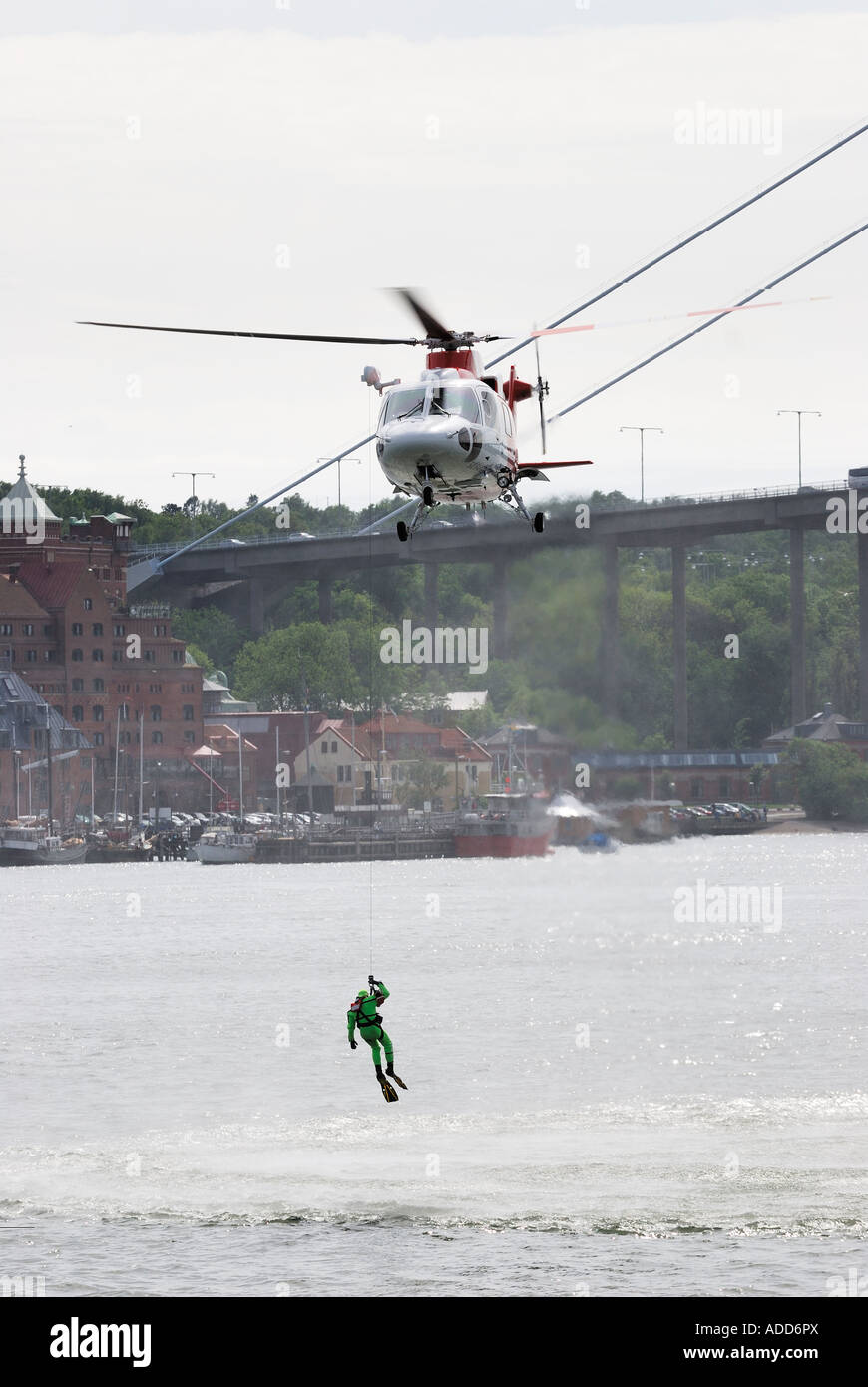 Helicopter performing rescue demonstration Stock Photo - Alamy