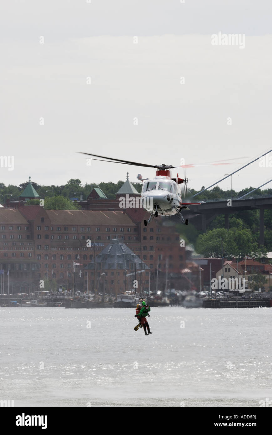 Helicopter performing rescue demonstration Stock Photo - Alamy