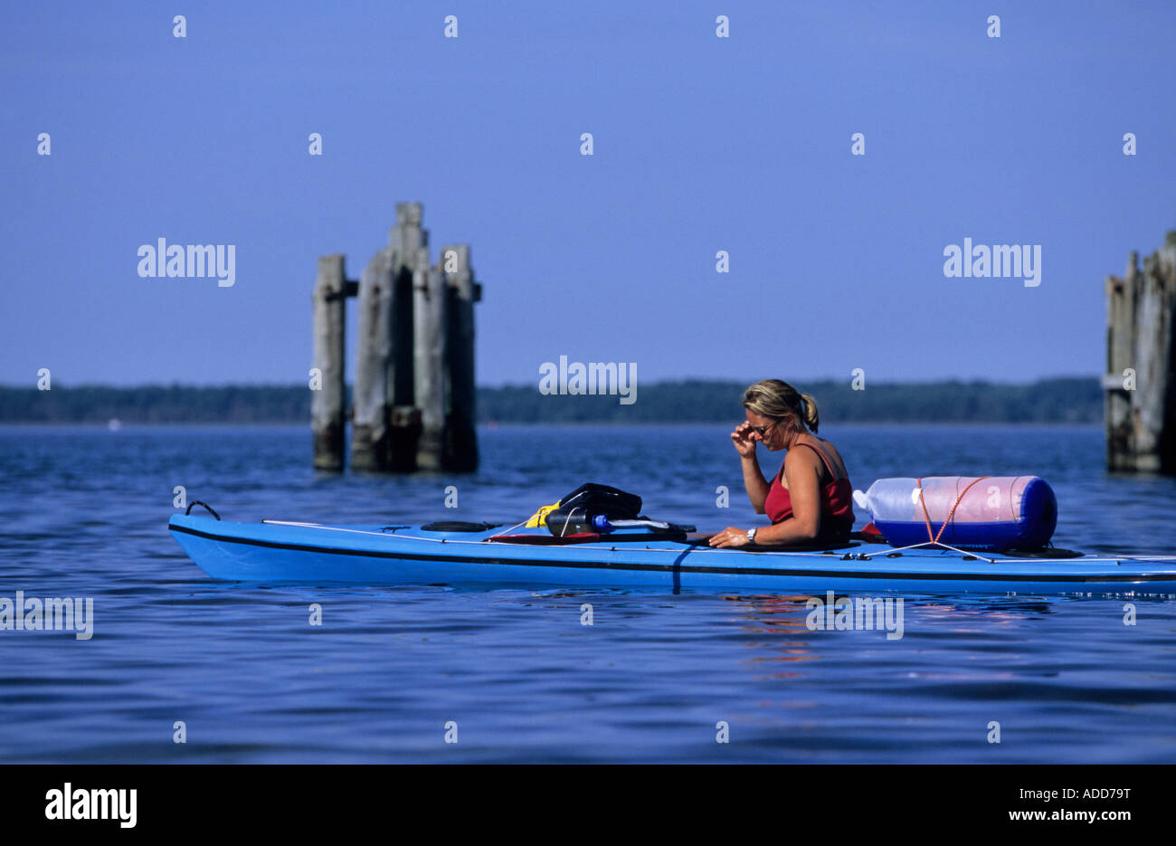 Sea Kayaker looking into Water Ruegen August 2005 Stock Photo - Alamy