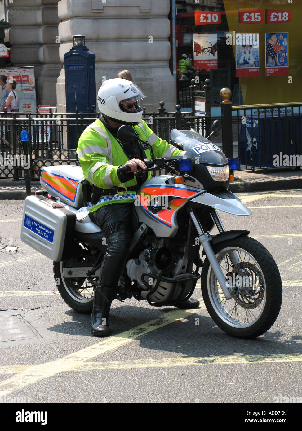 Police motorcycle outrider in Trafalgar Square, London Stock Photo - Alamy