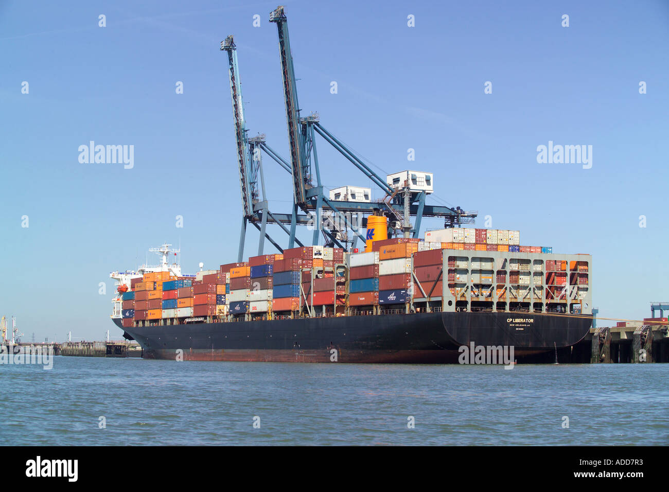container ship CP Liberator unloading at the thamesport in the river ...