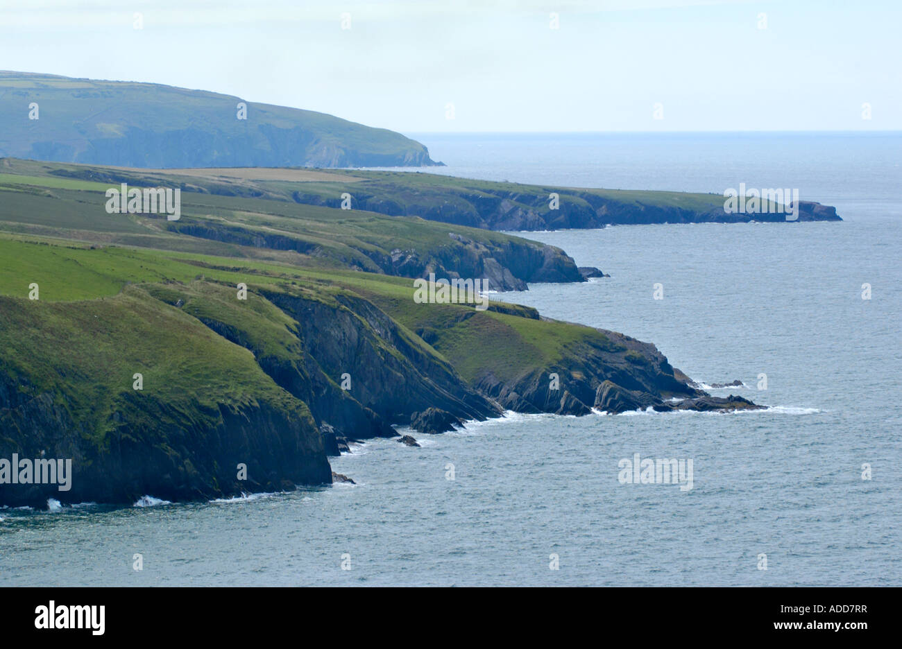 View over rocky rugged coastline of Cardigan Bay at Mwnt Pembrokeshire ...