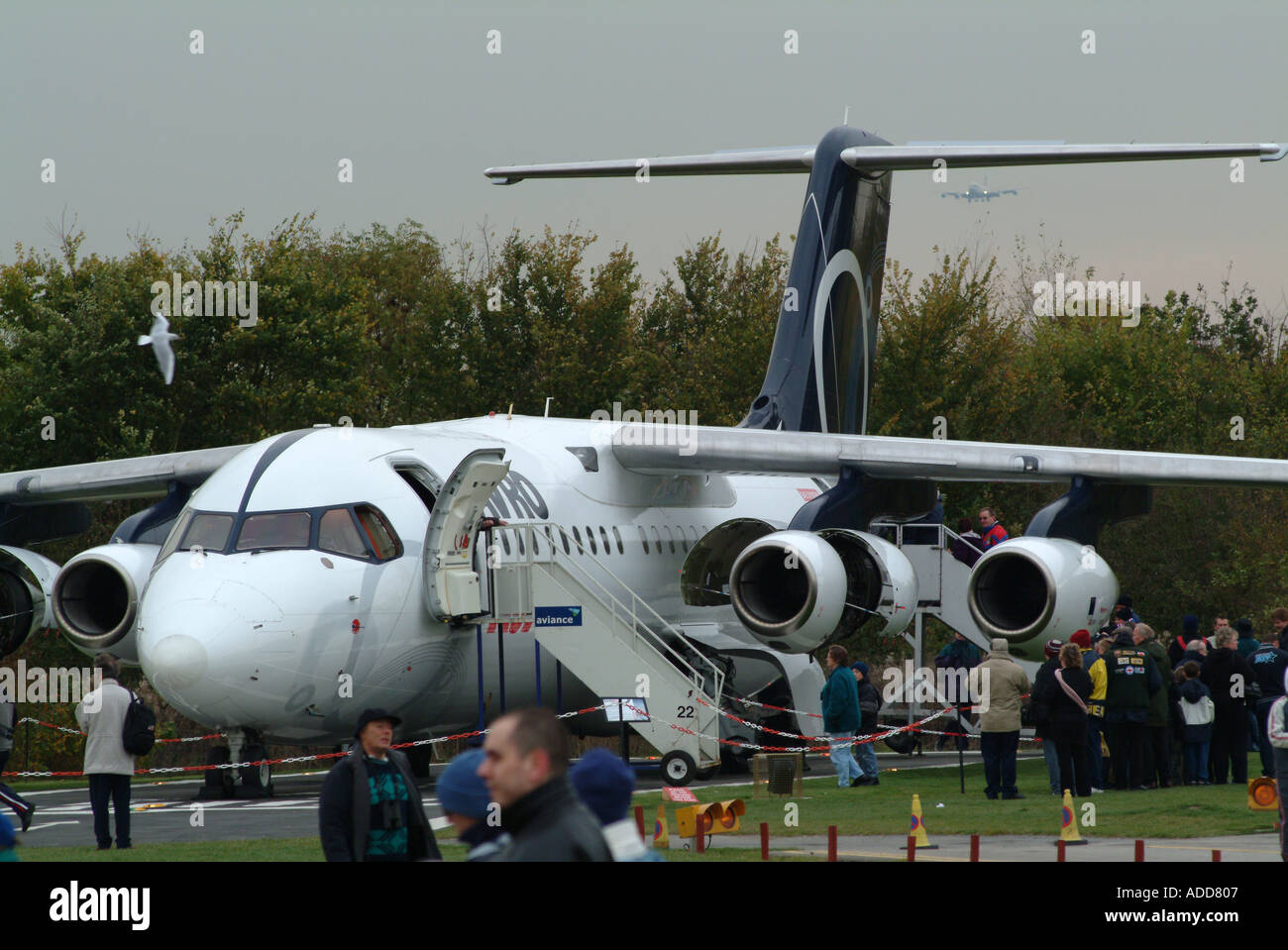 Static Display of BAe Avro RJ100 with Boeing 747 on Approach Behind ...