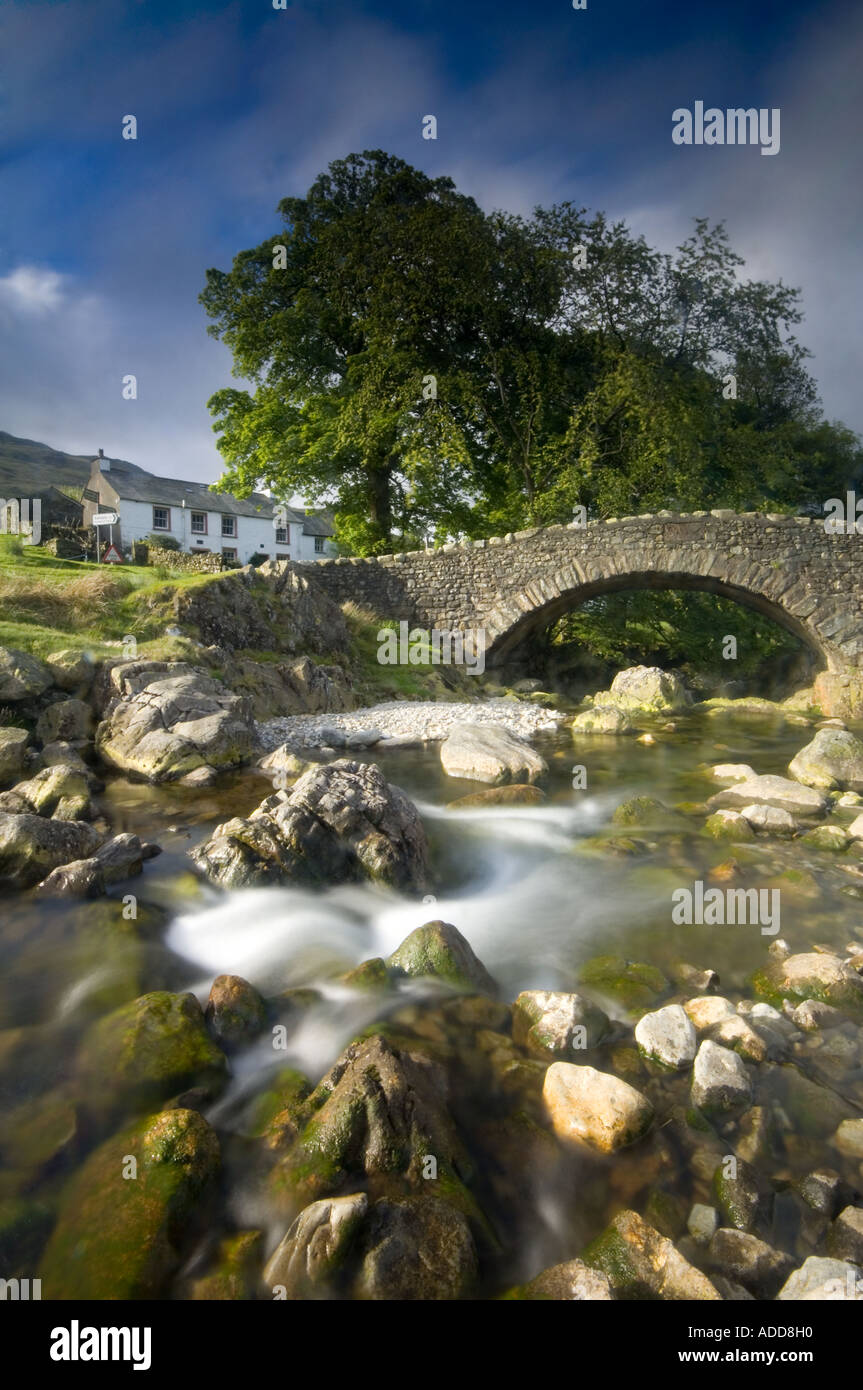 White Cottage and Stone Bridge Over the River Duddon at Cockley Beck ...